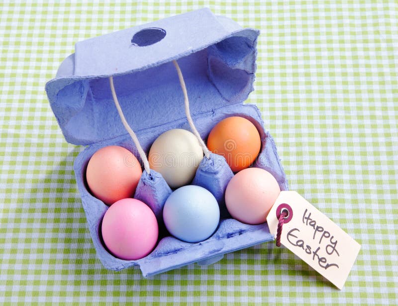 Het Karton Van Het Ei Met Verschillende Gekleurde Eieren Stock ...