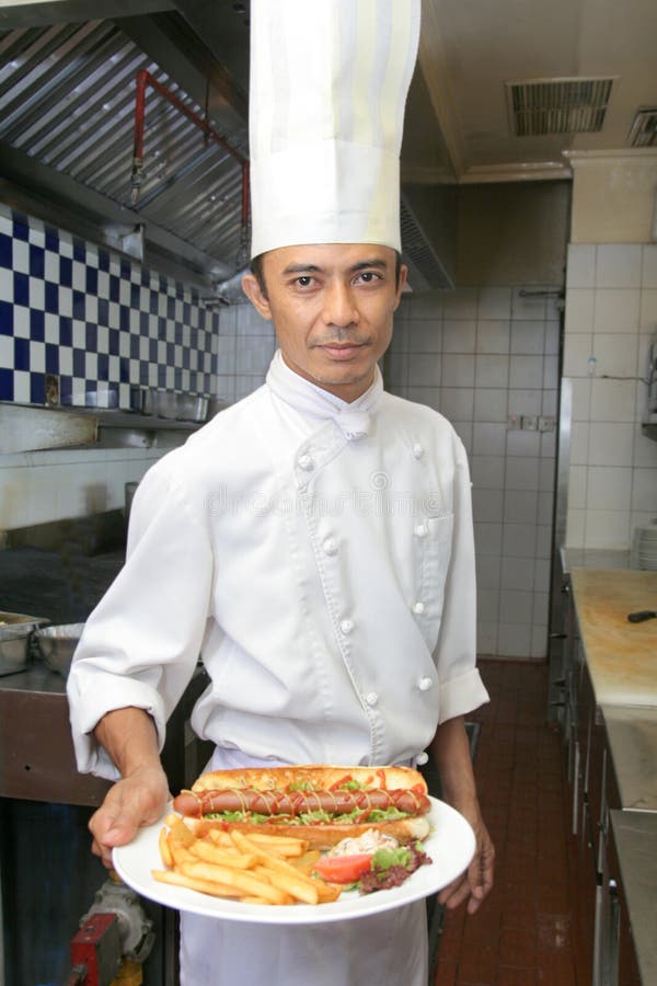 De Chef-kok Stelt Op Het Werk Stock Foto - Image of mens, chef: 9750066