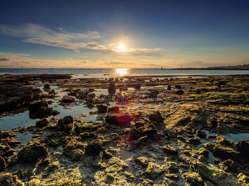 Het Strand Rockpool Van Het Rickettspunt Bij Zonsondergang Stock Foto ...