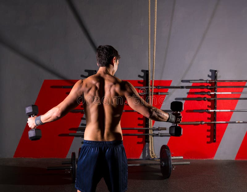 Hex Dumbbells Man Workout Rear View at Gym Stock Photo - Image of ...