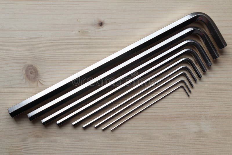 Old keys on workbench A stock image. Image of wooden - 33777551