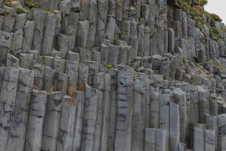 Hexagonal Basalt Columns with Greenery in Iceland S Rugged Landscape ...