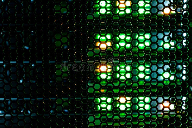 Hexagonal Mesh Texture of Metal Behind Which the Indicator Lights of ...