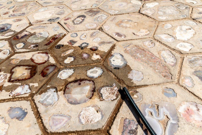Hexagonal Stone Tiles with Embedded Agate Stones Displaying Various ...