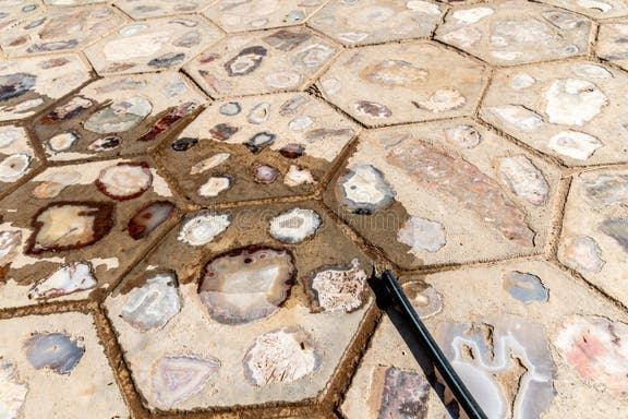 Hexagonal Stone Tiles with Embedded Agate Stones Displaying Various ...