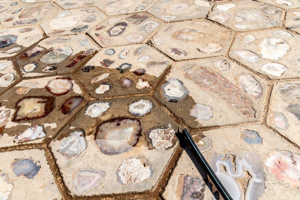 Hexagonal Stone Tiles with Embedded Agate Stones Displaying Various ...
