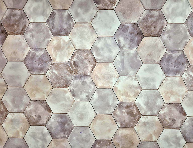 Hexagonal Tiles Arranged a Seamless Pattern, Featuring a Mix of Earthy ...