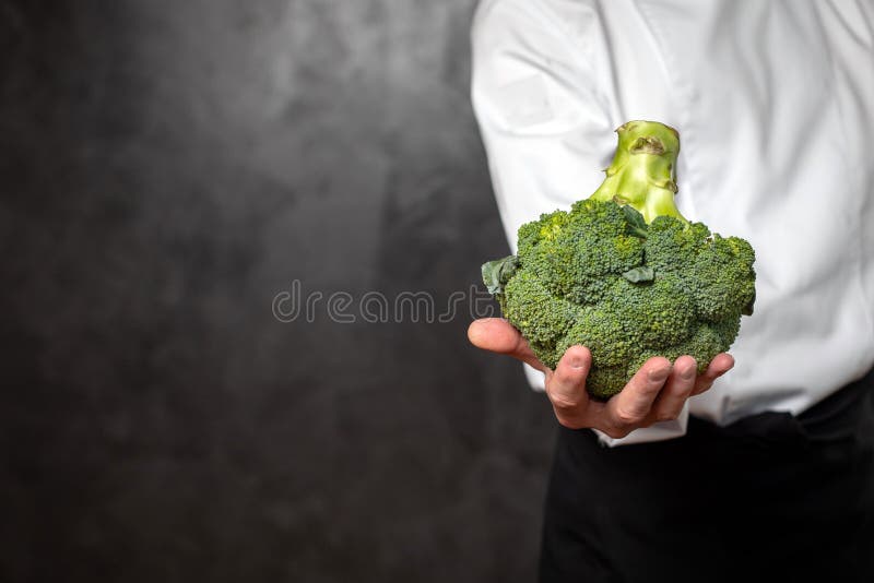 Hhand is Holding a Floret of Broccoli Stock Photo - Image of healthy ...