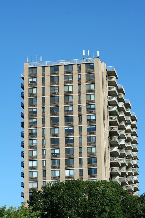 Hi-rise apartment building stock image. Image of home - 6561311