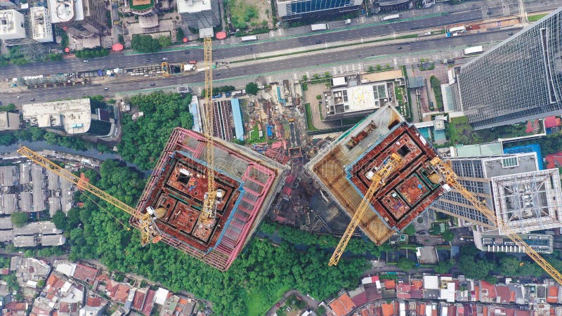 Hi-rise Skeleton Construction Site with the Yellow Crane Stock Photo ...