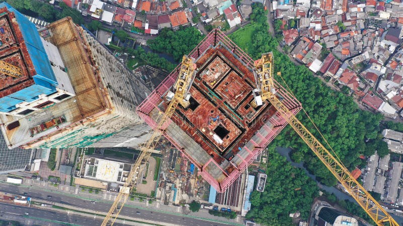 Hi-rise Skeleton Construction Site with the Yellow Crane Stock Photo ...