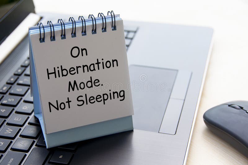 On Hibernation Mode. Not Sleeping Text on White Table Calendar on ... On Hibernation Mode. Not Sleeping Text on White Table Calendar on ...