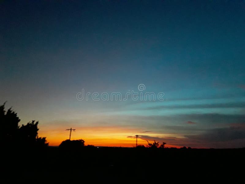 Hidden behind the blue stock image. Image of sunset - 169639351