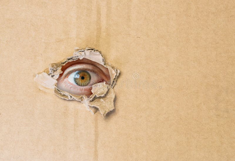 Hidden Eye Watching through Hole in Cardboard Paper Stock Photo - Image ...