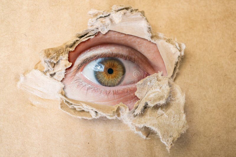 Hidden Eye Watching through Hole in Cardboard Paper Stock Image - Image ...