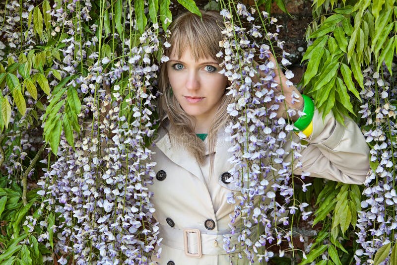 Hidden in flowers stock photo. Image of portrait, summer - 20505126