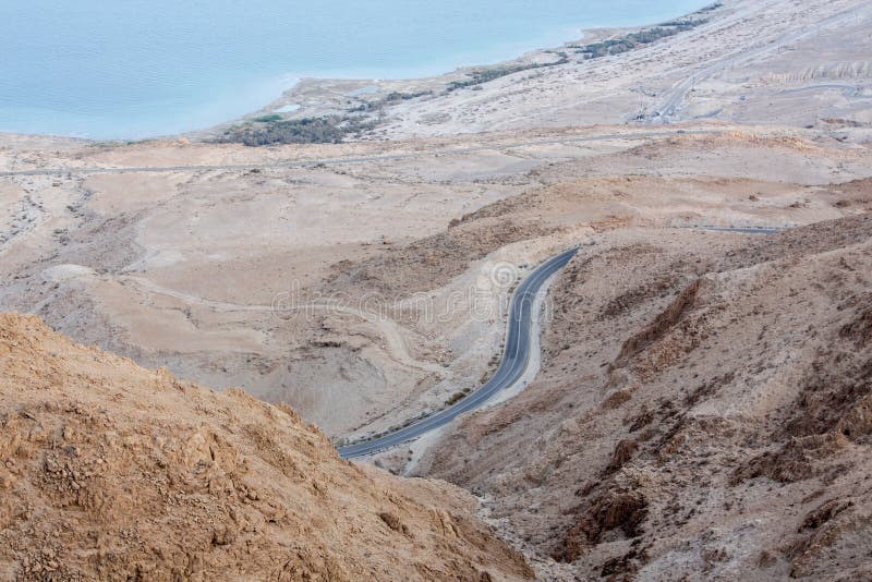 A hidden road in a desert stock photo. Image of deserted - 29754578