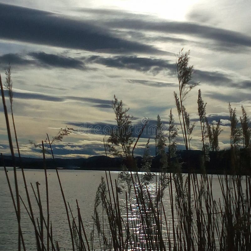 The hidden Sun stock image. Image of water, evening - 219888717