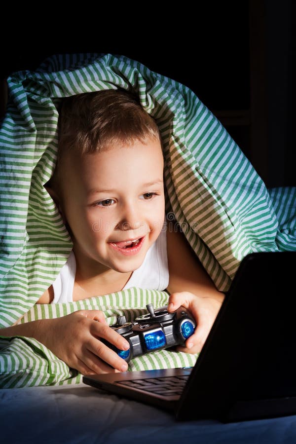Hide from mom, play games stock photo. Image of digital - 28689194