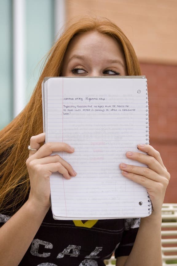 Hiding behind notes stock photo. Image of school, teen - 6803750