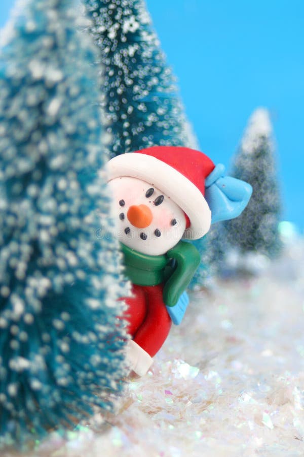 Snowman Peeking Around a Corner Stock Photo - Image of star, pottery ...