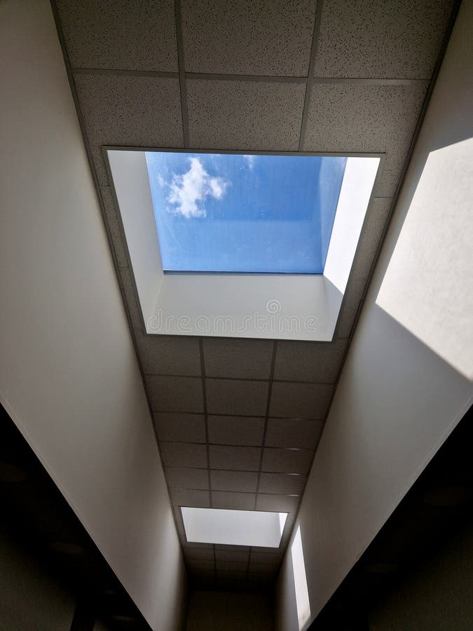 High Above the Head is a Rectangular Window Illuminating the Stock ...