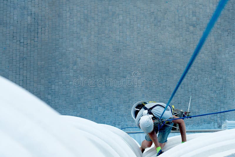 High-altitude Climber. the Profession of Working at Height Stock Photo ...