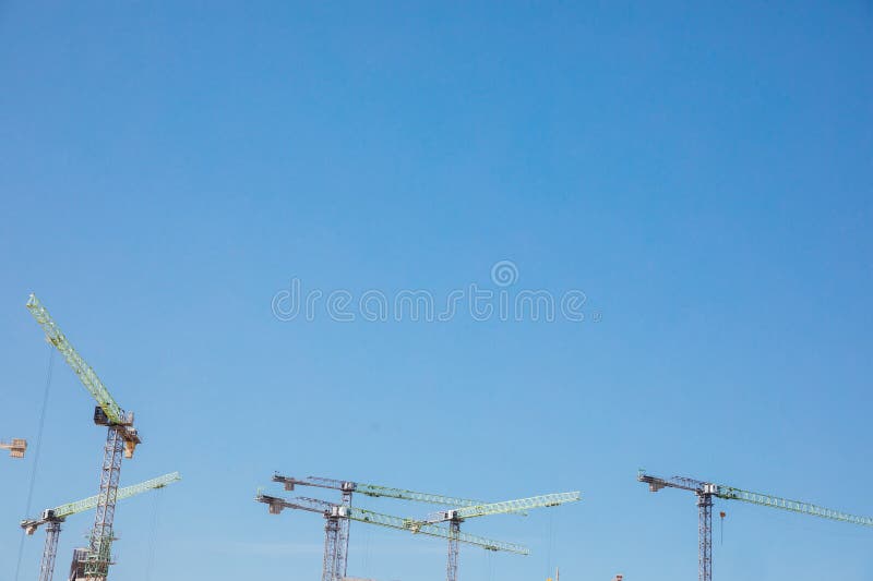 High-altitude Cranes for Lifting Loads at a Construction Site in the ...