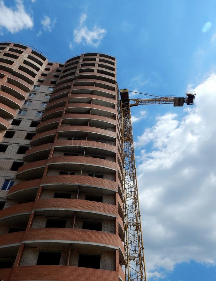 High-altitude Tower Crane Works at Multi-storey Building Construction ...