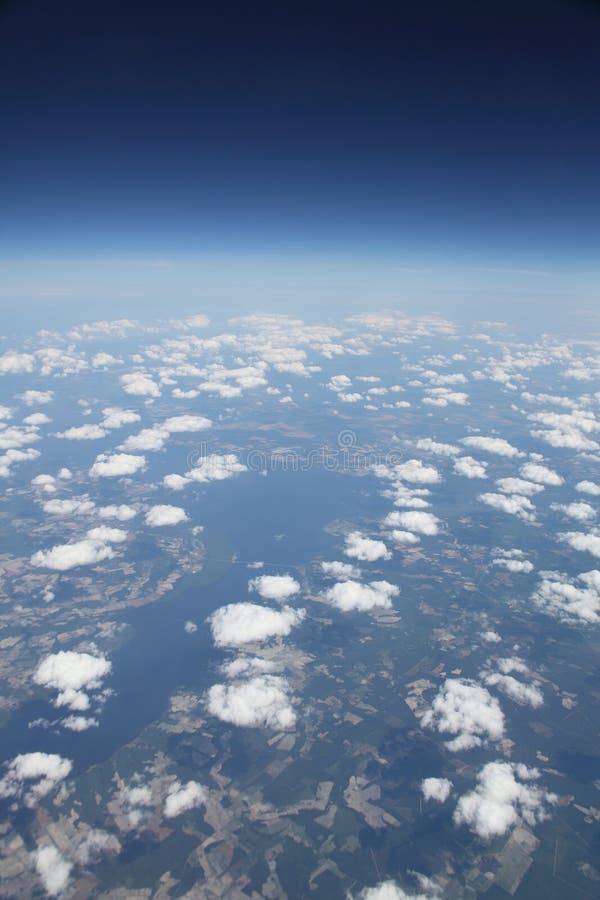 High Altitude View of Fluffy Clouds Sky and Earth Stock Image - Image ...