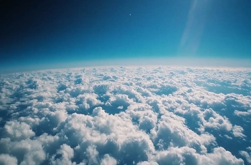 High Altitude View of White Clouds and Blue Sky from Airplane Window ...