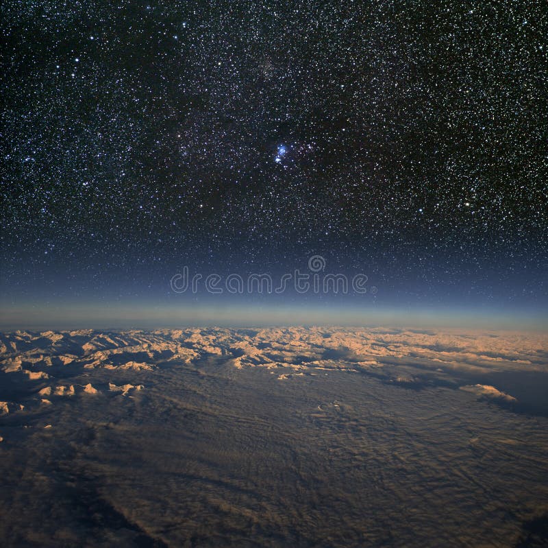 High Altitude View of the Night Sky Over Cloudy Mountains Stock Image ...