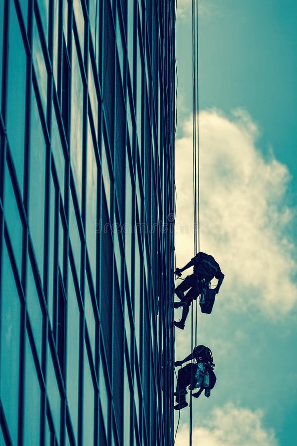 Skyscraper Workers stock image. Image of window, pane - 1535475