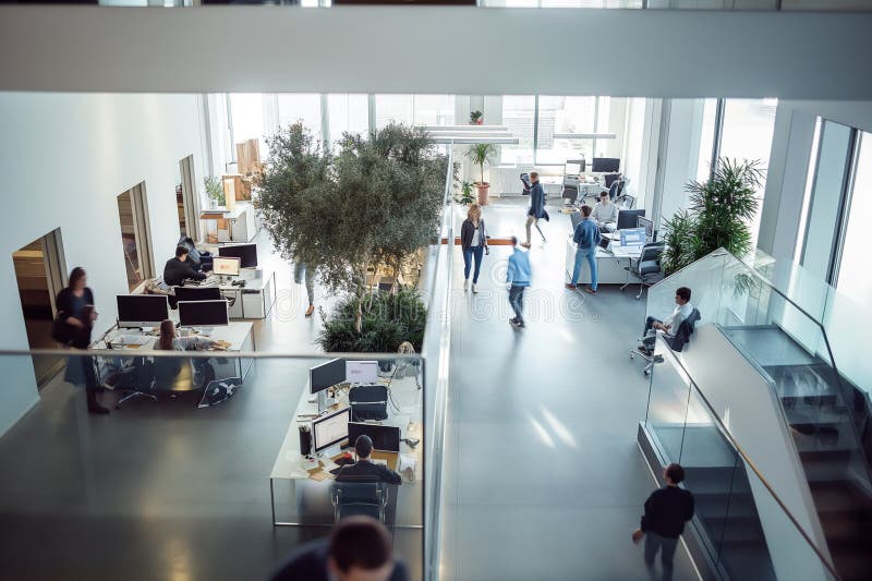 High Angle Blurred Office Workers in Modern Offices Talking and Sitting ...