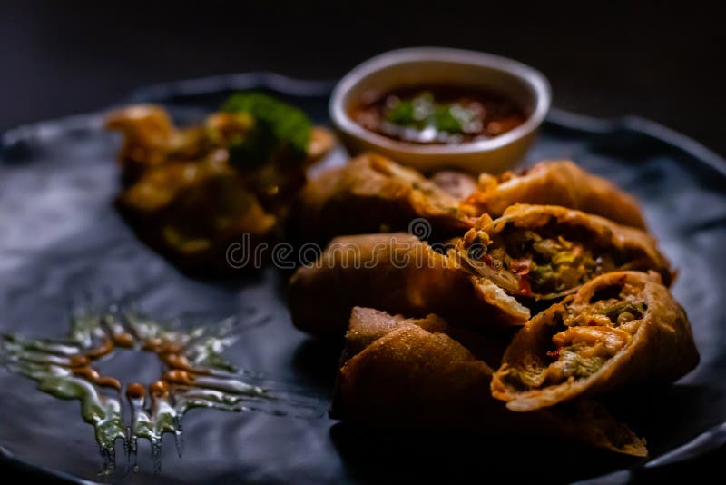 High Angle Close Up of Beautiful Garnished Cheese & Bell Papper Roll ...