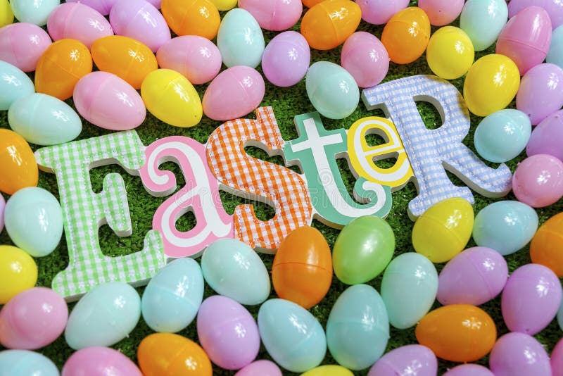 High Angle and Close Up of Easter Banner Letters Surrounded by Colorful ...