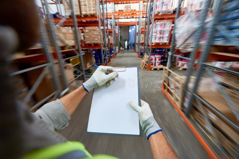 Filling Documents In The Warehouse Stock Photo - Image of products ...