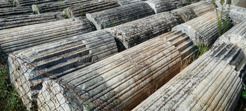 High Angle Closeup of the Concrete Posts Stacked on the Grounds Stock ...