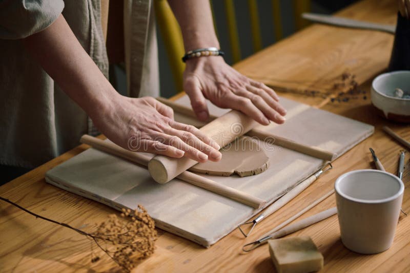 Hands of Unrecognizable Female Artisan Rolling Out Clay Stock Photo ...