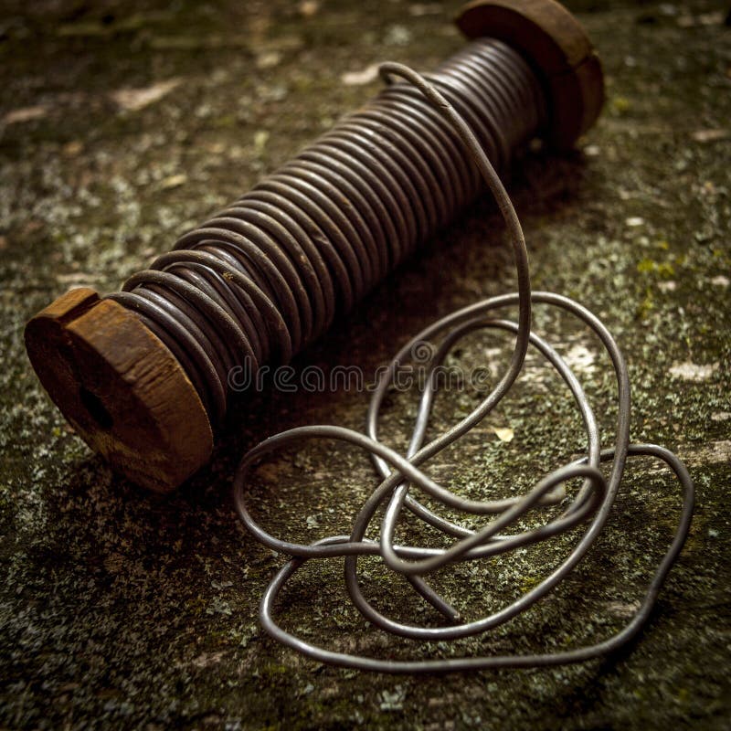 High Angle Closeup Shot of a Metal Wire on a Ground - Perfect for ...