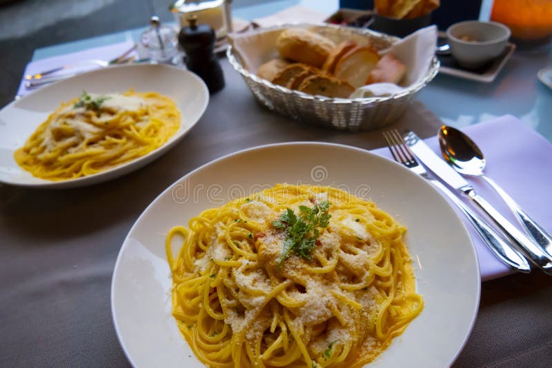 High Angle Closeup Shot of Two Plates with Carbonara Spaghetti on a ...