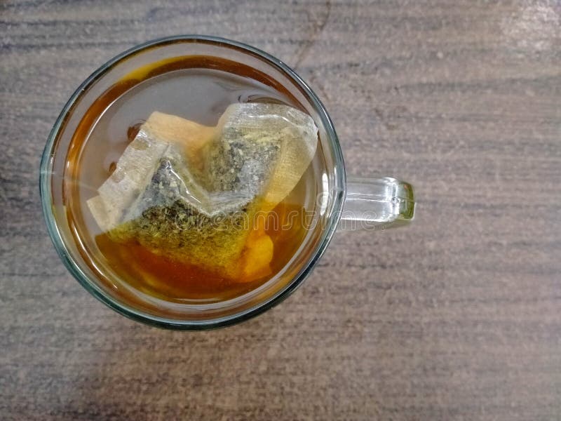 The High Angle of a Cup of Tea is Occurring in the Left Side Wooden ...