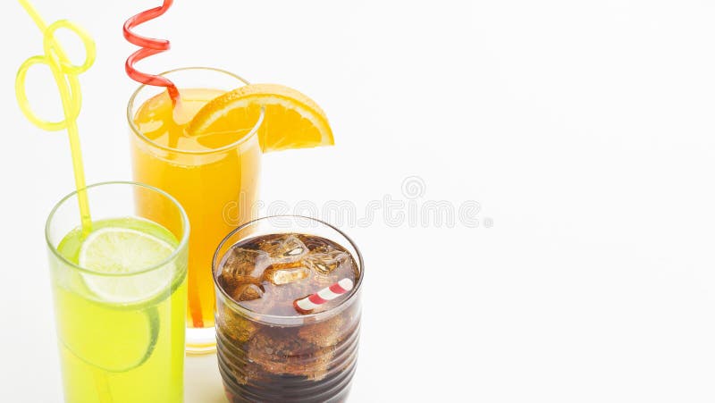 High Angle Glasses with Soft Drinks Straws. High Quality Photo Stock ...