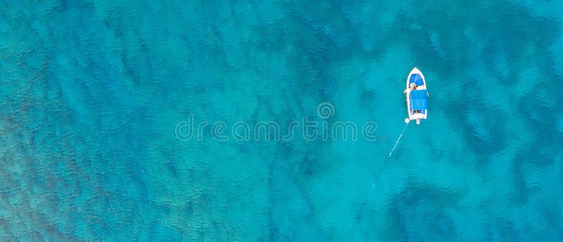 High Angle Panoramic Shot of a Boat in the Middle of the Ocean Stock ...