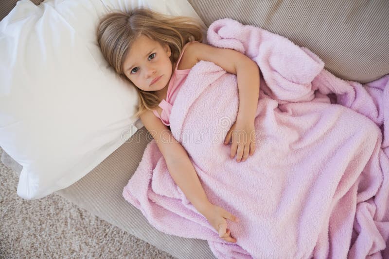 High Angle Portrait of Cute Girl Resting on Sofa Stock Photo - Image of ...