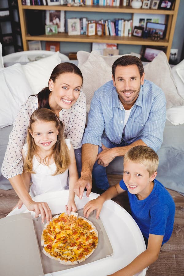 High Angle Portrait of Family with Pizza Stock Image - Image of casual ...