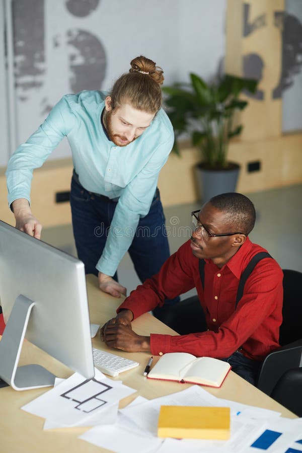 Two Entrepreneurs Using Computer Stock Photo - Image of meeting ...