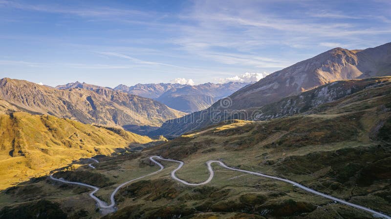 High-angle of Road Trails on a Mountain Covered with Yellowing Grass ...