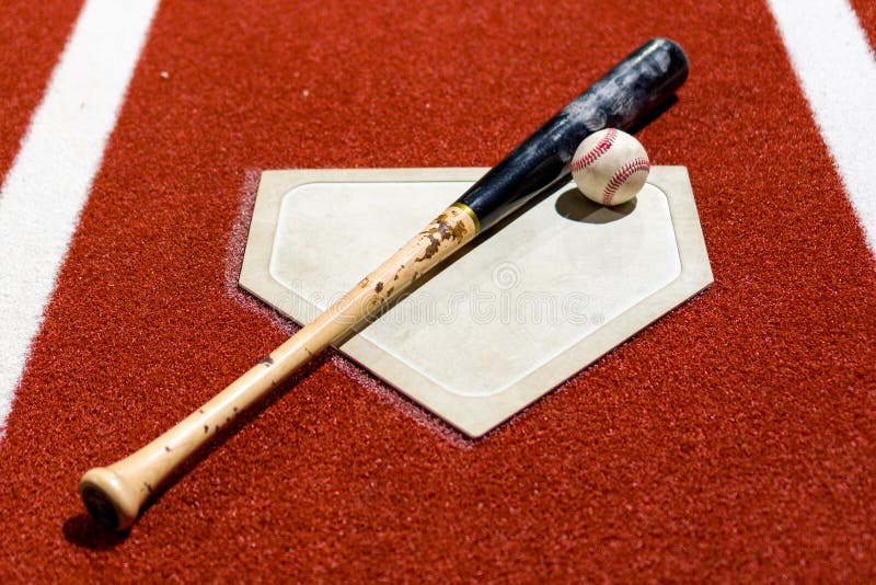 High Angle Shot of a Baseball and a Bat on the Ground Stock Image ...