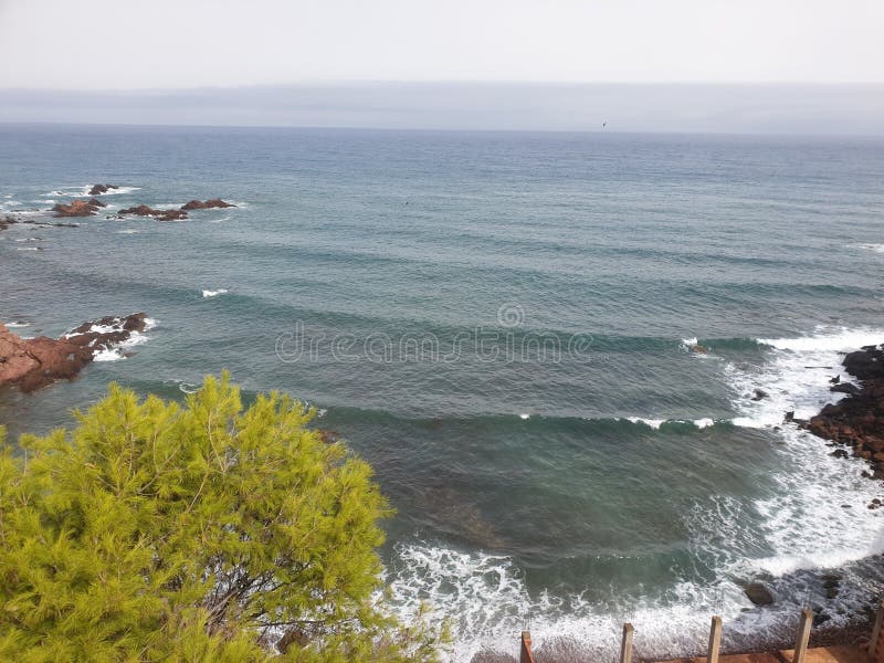 High Angle Shot of a Beach with Rocky Shore Stock Image - Image of ...